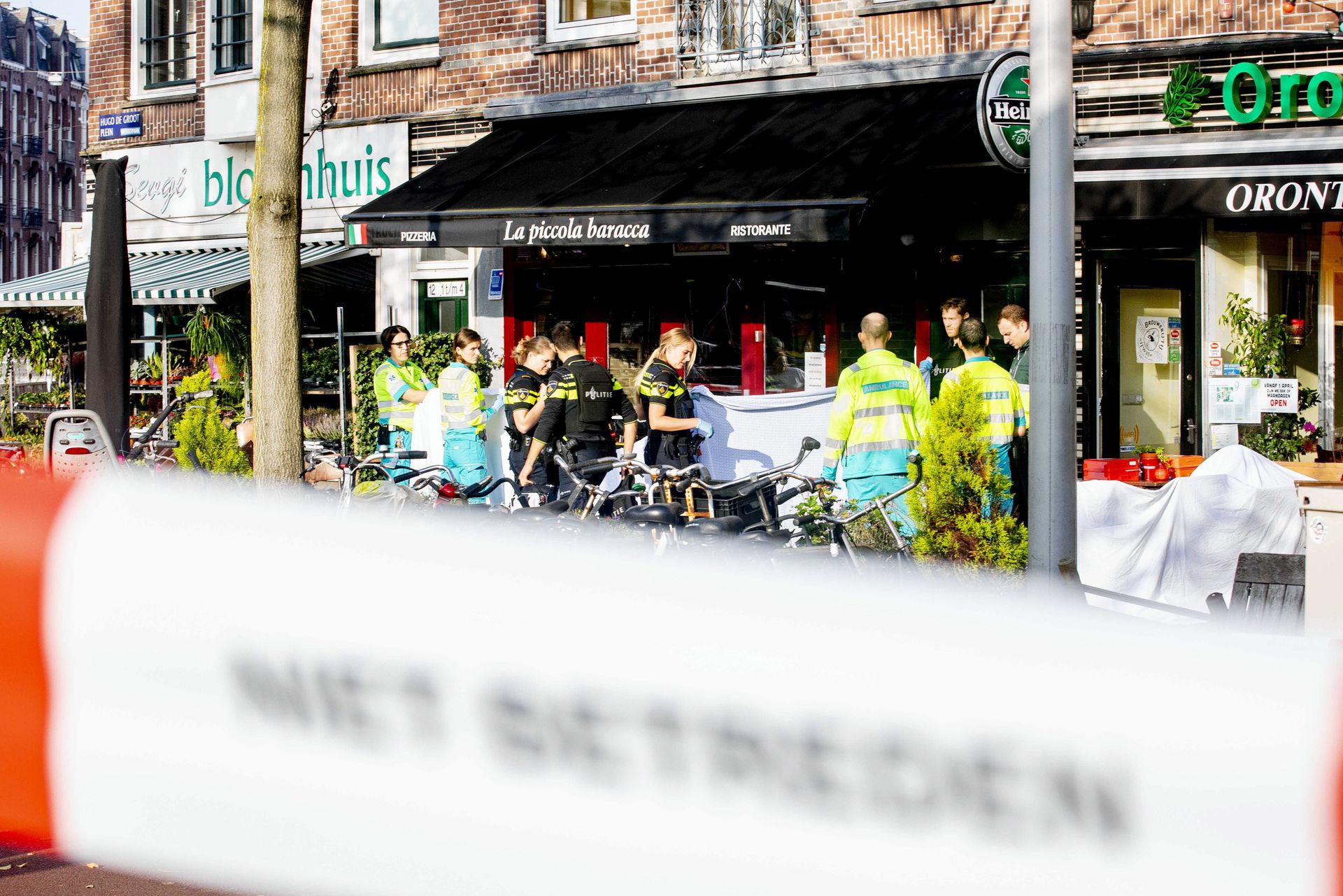 Dode en gewonde bij schietpartij in Amsterdam - NRC