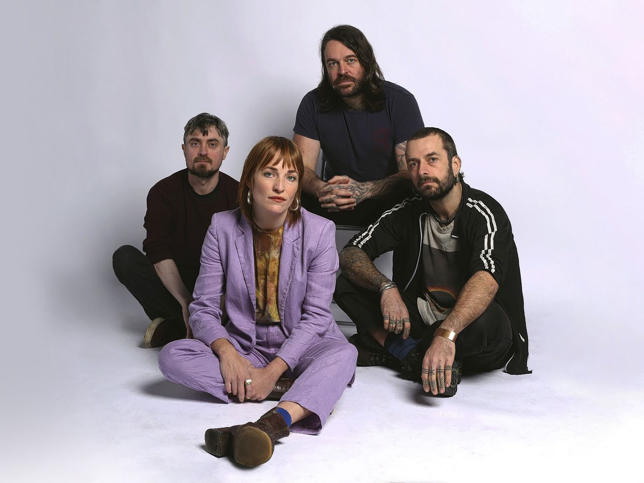 Lankum: ‘Onze muziek is een hamerslag, een klap op je kop’ - NRC