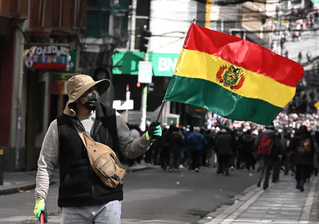 Waarom straatprotesten Bolivia al weken lam leggen: ‘Neem ontslag ...