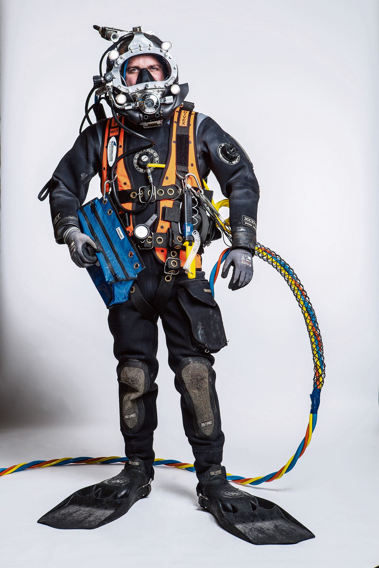 Zijn werkpak lijkt afkomstig uit een James Bond-film - NRC