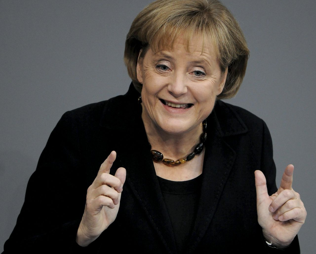 Wie wil weten hoe Merkel re(a)geert, kijkt naar haar lichaamstaal - NRC